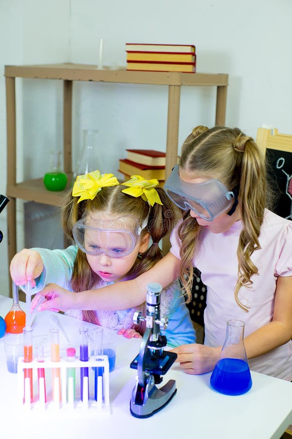 Kids Making Science Experiments Stock Image - Image of female, fire ...
