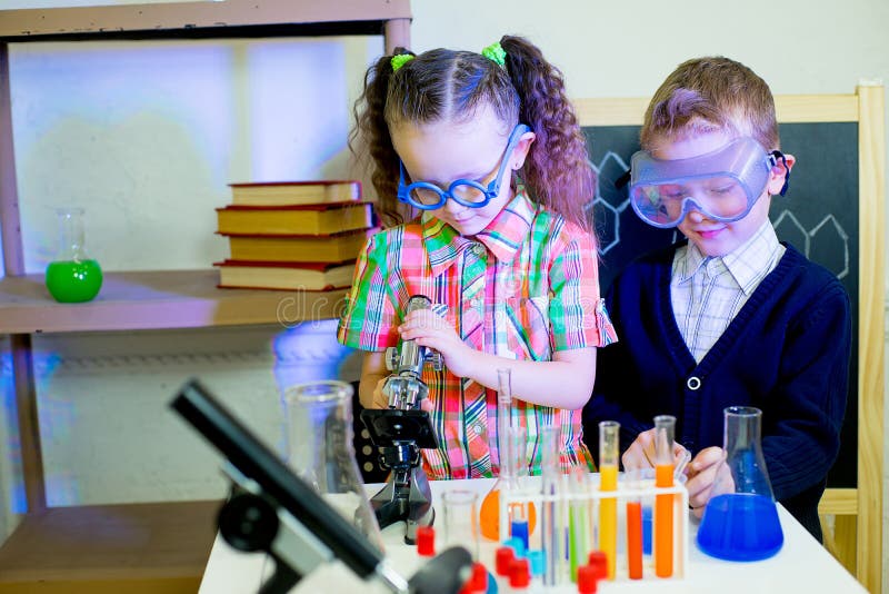 Kids Making Science Experiments Stock Photo - Image of learning, group ...