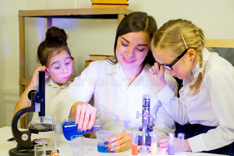 Kids Making Science Experiments Stock Photo - Image of biotechnology ...
