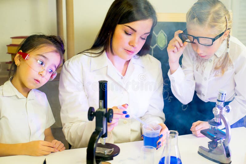 Kids Making Science Experiments Stock Photo - Image of chemist, kids ...