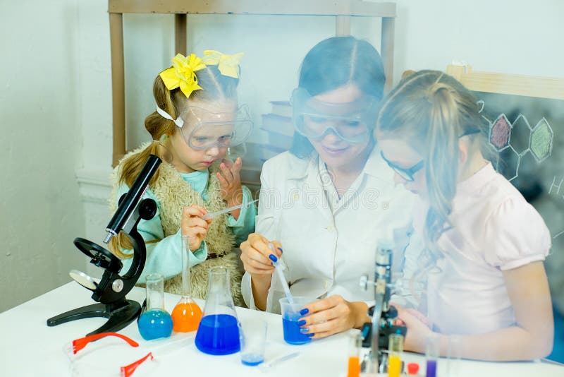 Kids Making Science Experiments Stock Photo - Image of microscope ...
