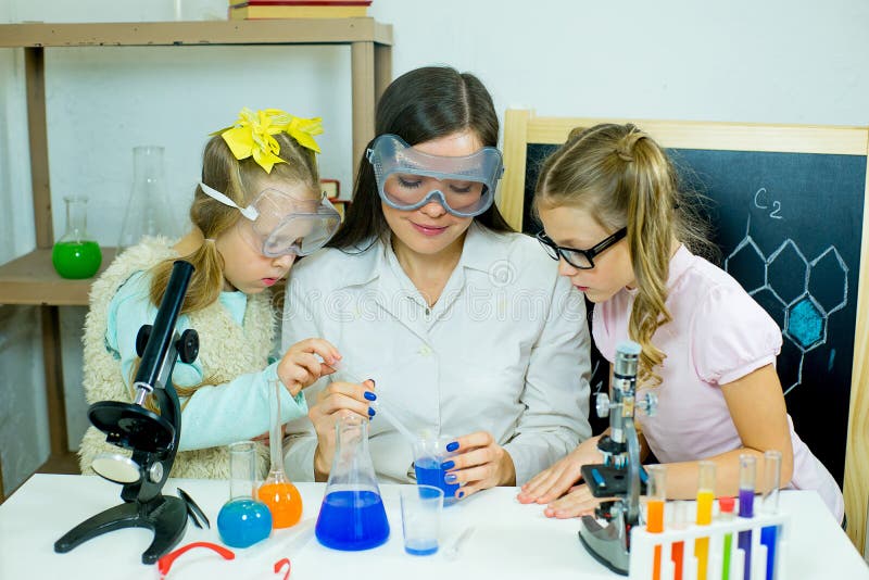 Kids Making Science Experiments Stock Photo - Image of analyzing, fire ...