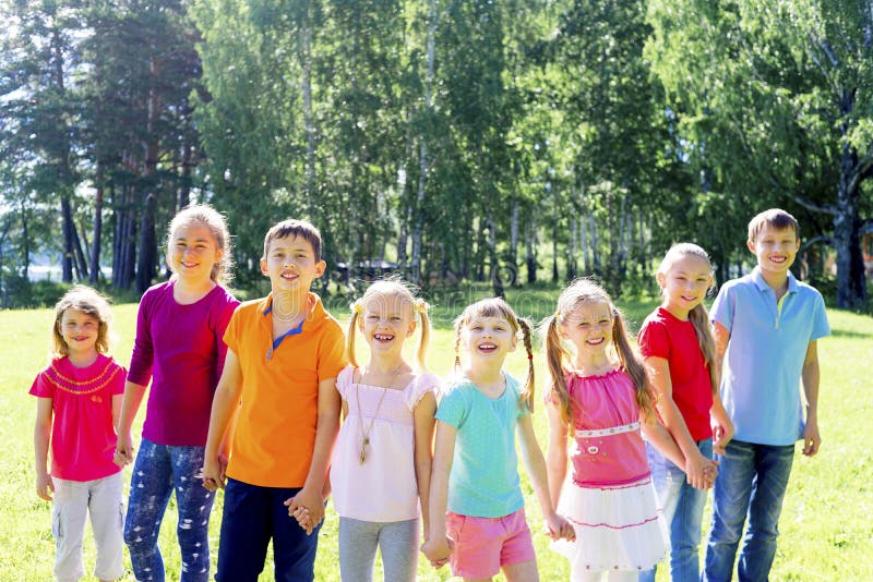 Kids outside in park stock image. Image of girl, field - 99757939