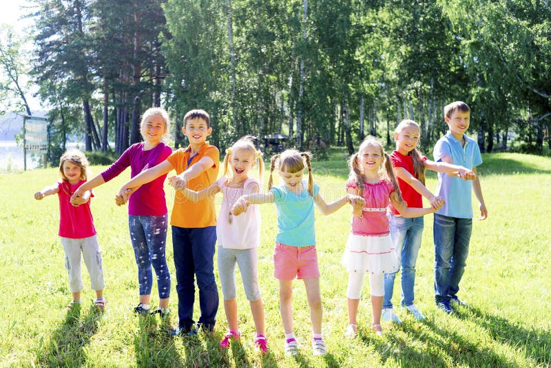 Kids outside in park stock photo. Image of sunny, lawn - 99758272