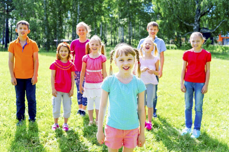 Kids outside in park stock photo. Image of summer, green - 99823816