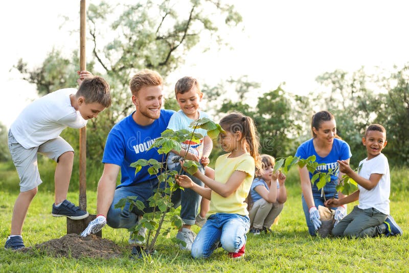 Kids Planting Trees with Volunteers Stock Photo - Image of african ...