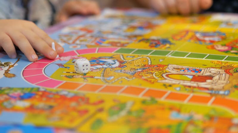 The Kids Play Board Games at the Table with Family Stock Footage ...