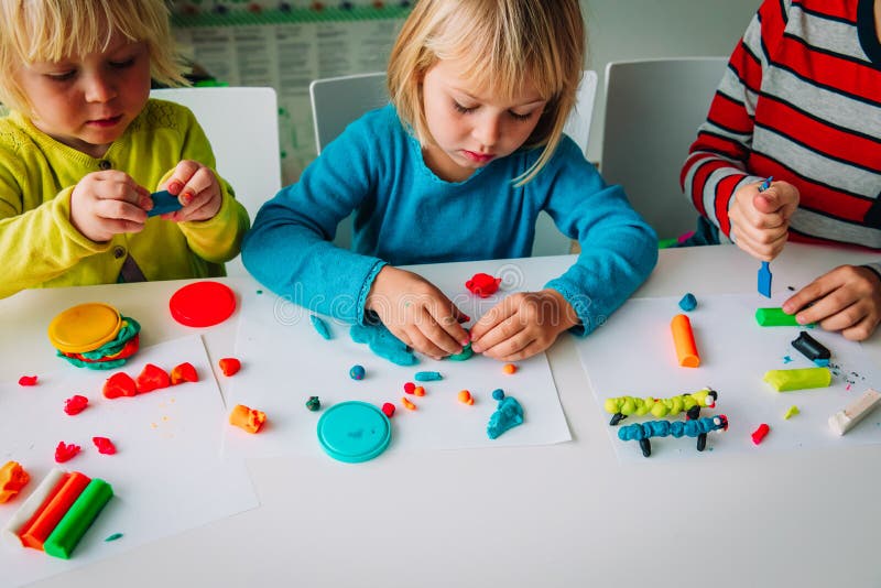 Kids Play with Clay Molding Shapes, Learning through Play Stock Image ...