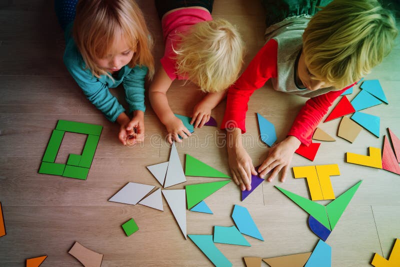 Kids Play with Puzzle, Learn Math, Education Concept Stock Photo ...