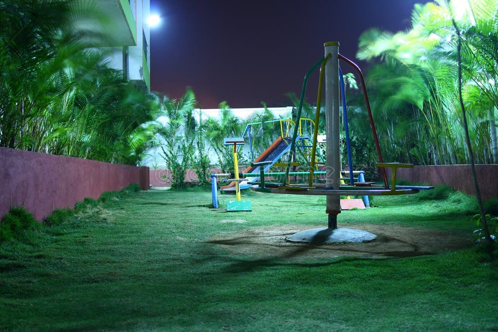 Kids Playground at Night stock image. Image of green - 19474967
