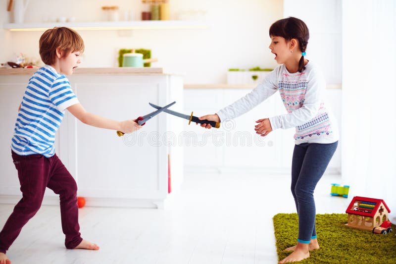 Kids Playing Active Fight Games at Home Kitchen Stock Photo - Image of ...
