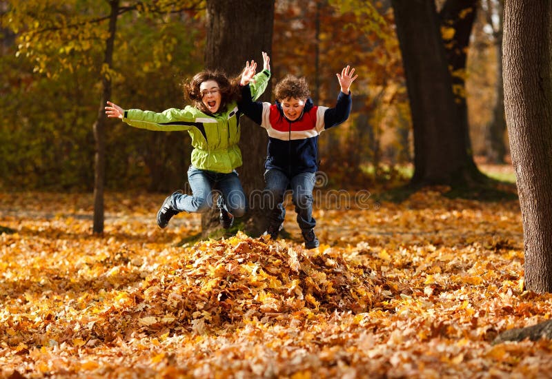 Kids Playing in Autumn Park Stock Image - Image of park, girl: 23097143