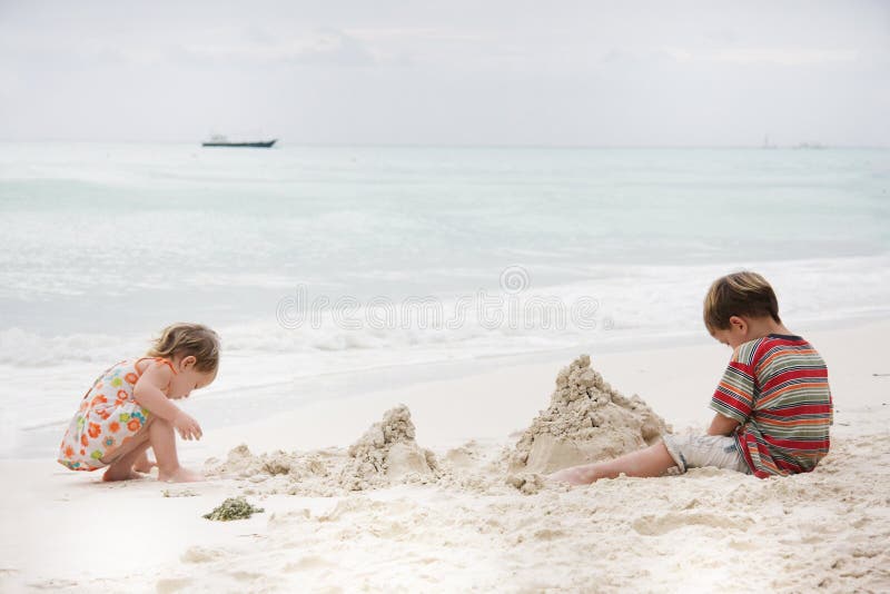 Kids playing on beach stock photo. Image of alone, beach - 17883616