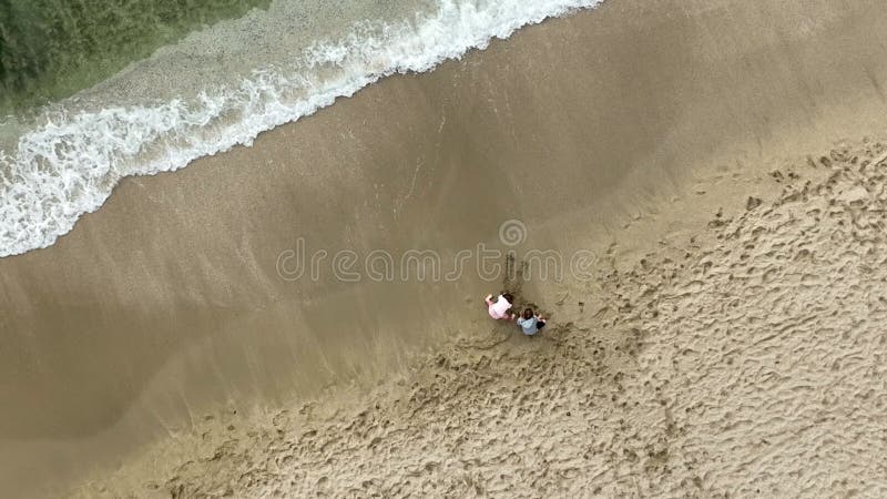 Kids Playing on the Beach Aerial View 4 K Stock Video - Video of ...