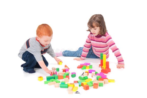 Kids playing with blocks stock photo. Image of colourful - 15590500