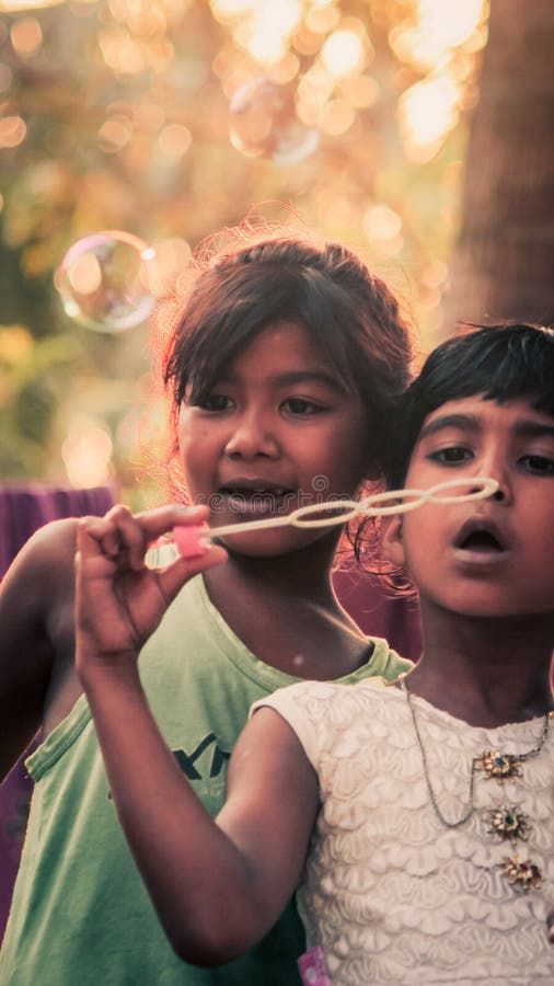 Summer Time Fun Kids are Playing with Bubble Editorial Photography ...