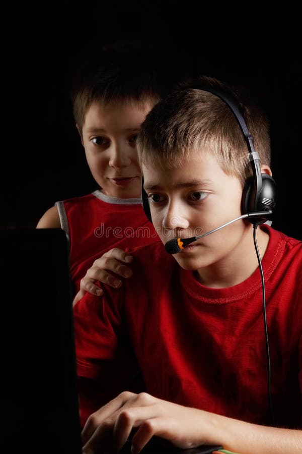 Kids playing computer game stock image. Image of computer - 32913393