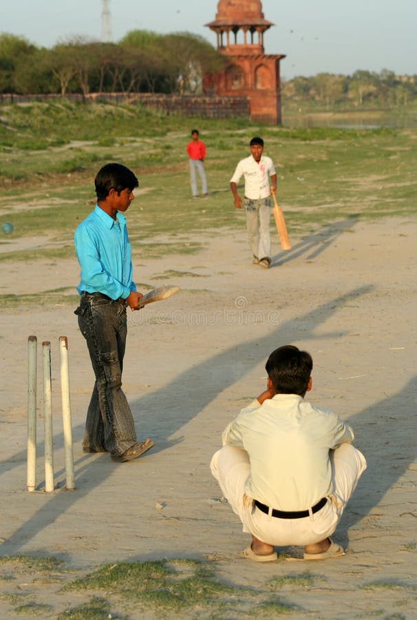 Kids playing cricket editorial stock photo. Image of enjoy - 25995243