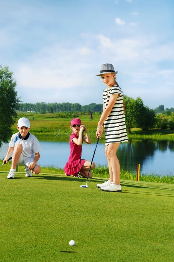 Kids playing golf stock image. Image of green, active - 61269017