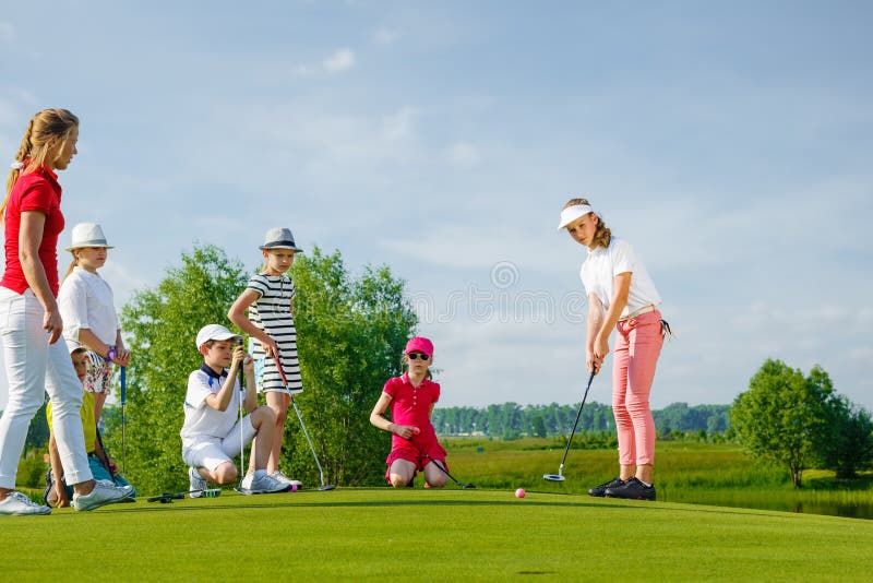 Kids playing golf stock photo. Image of outdoors, hobby - 68619724