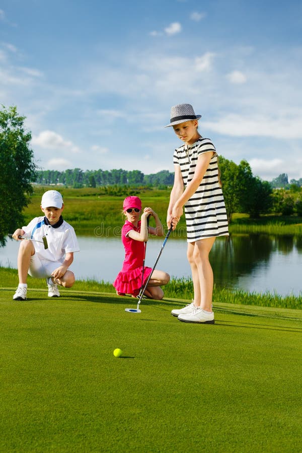 Kids playing golf stock photo. Image of caucasian, outside - 68619812