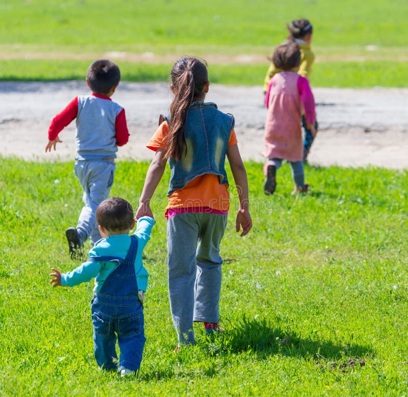 Kids Playing on the Grass in the Park Editorial Image - Image of park ...