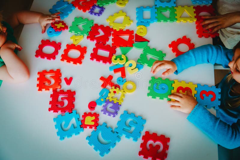 Kids Playing with Number and Shapes Puzzle Stock Image - Image of play ...