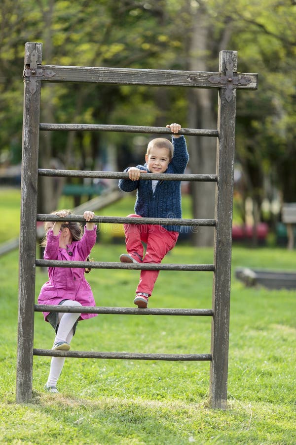 Kids playing at playground stock photo. Image of lifestyle - 40267274