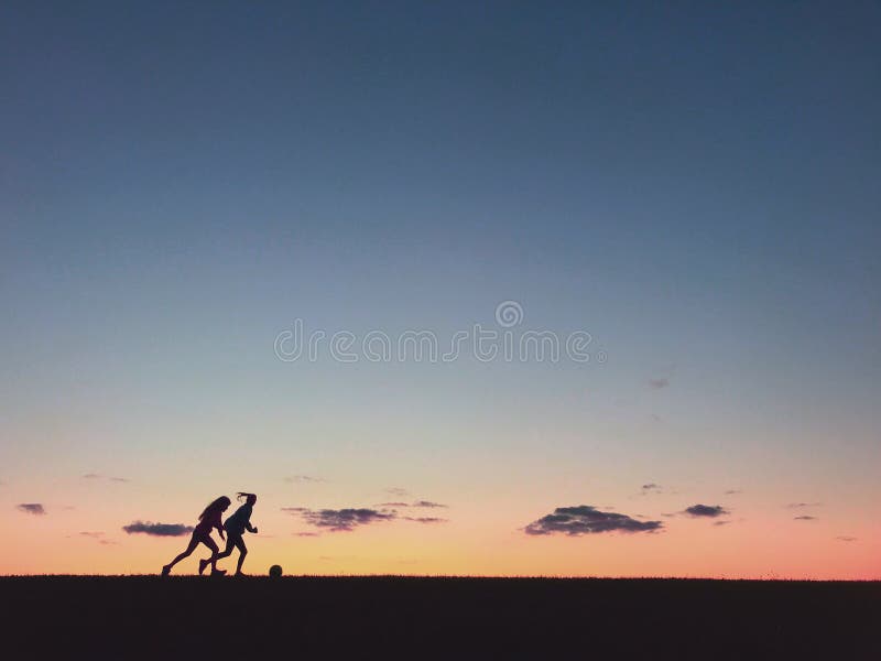 Kids Playing Soccer at Sunset Stock Image - Image of sports, soccer ...