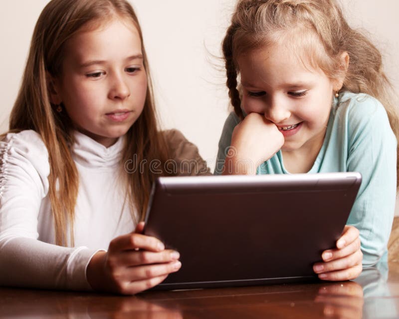 Kids playing on tablet stock photo. Image of offspring - 78950448