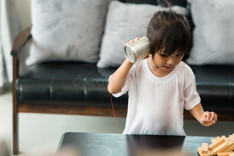 Kids Playing with Tin Can and String Phone As Communication Concept ...