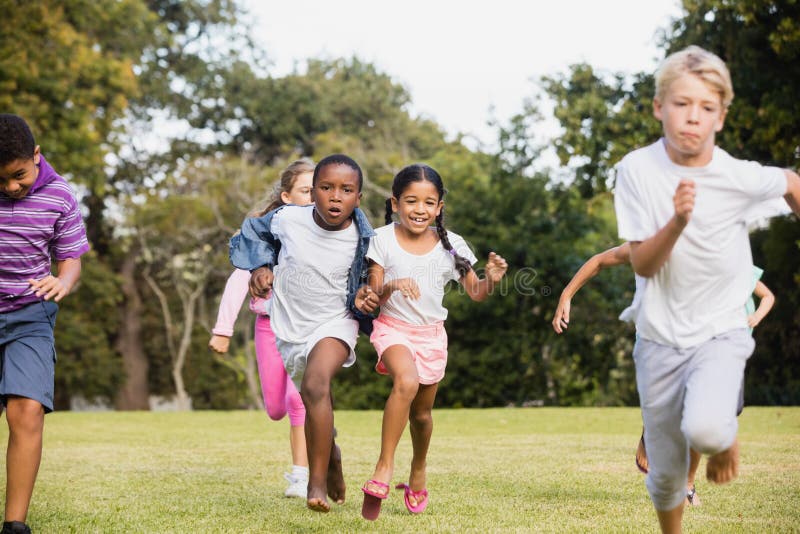 Kids Playing Together during a Sunny Day Stock Image - Image of ...