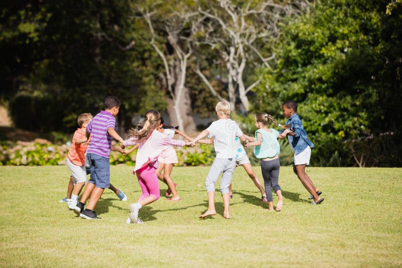 Kids Playing Together during a Sunny Day Stock Photo - Image of ...