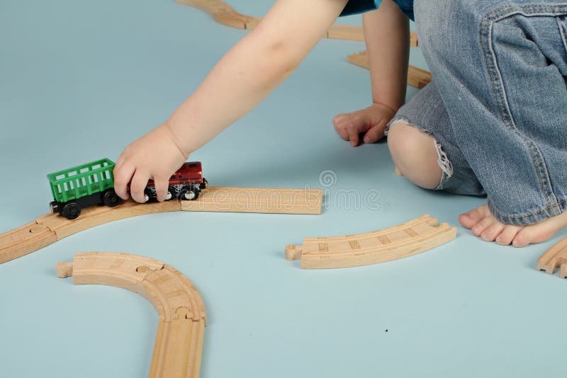 Kids Playing with Toy Trains Stock Photo - Image of blue, skills: 39117068