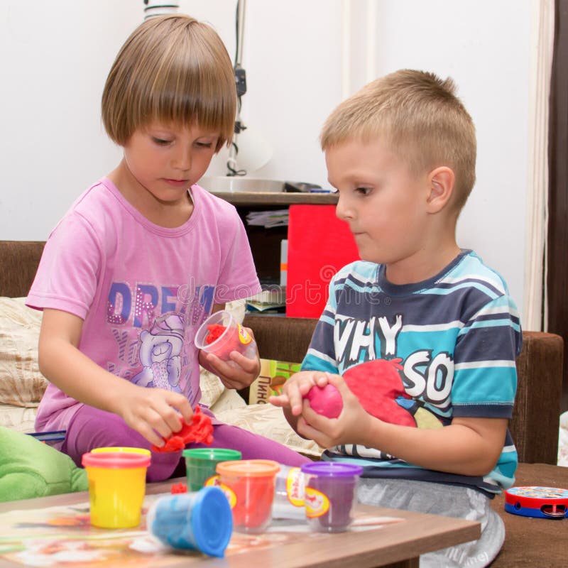 Kids are playing with toys stock image. Image of indoors - 85519721