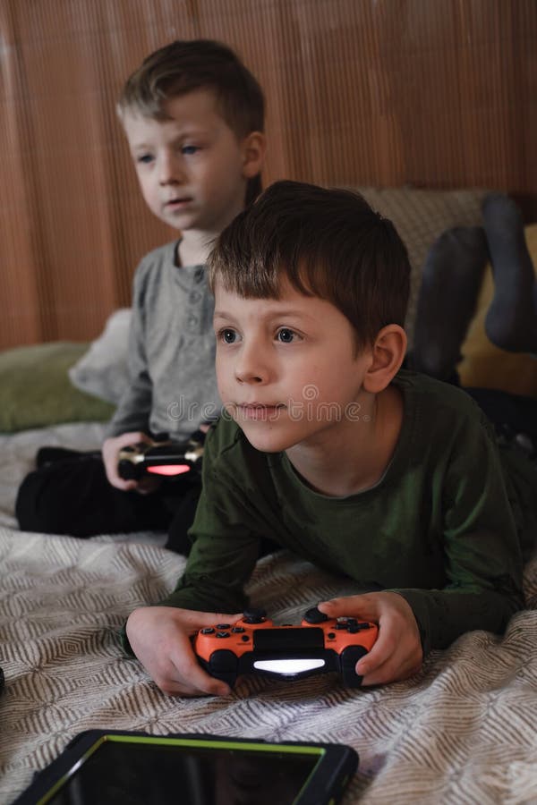Kids Playing Video Games at Home on Console Stock Image - Image of ...
