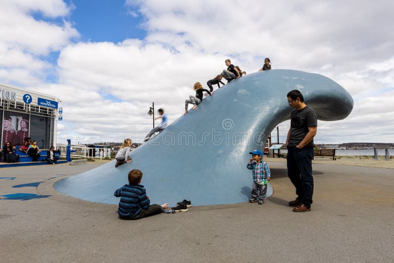 Kids are playing on a wave editorial image. Image of travel - 157753580