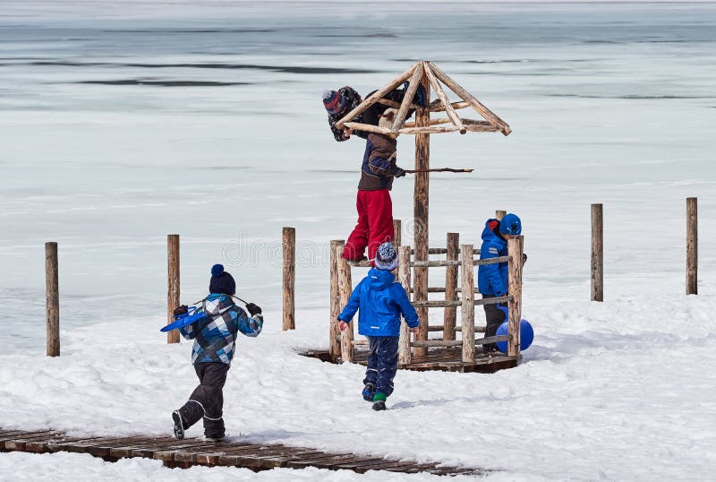 Kids playing in winter editorial photo. Image of outdoor - 112171501