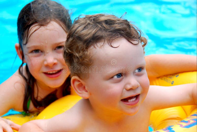 Kids in Pool stock image. Image of travel, floaty, sibling - 4656501