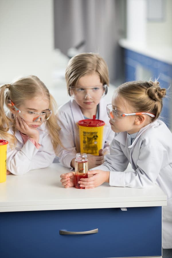 Kids in Protective Glasses Making Experiment Stock Photo - Image of ...