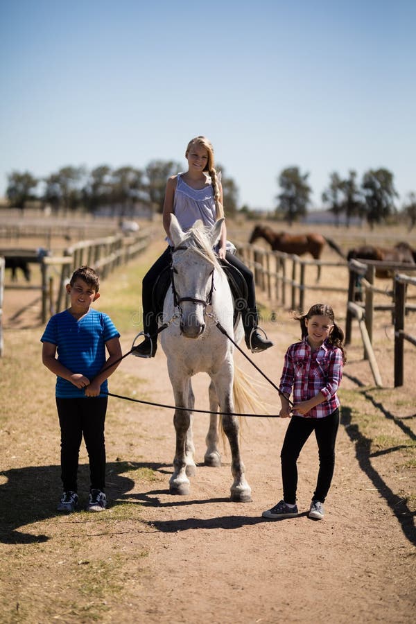 Kids Riding a Horse in the Ranch Stock Image - Image of horseriding ...