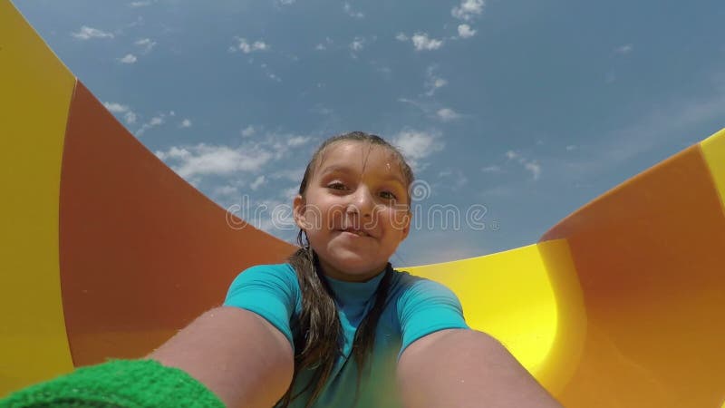 Kids Roll with Water Slide with Camera in Hand Stock Footage - Video of ...