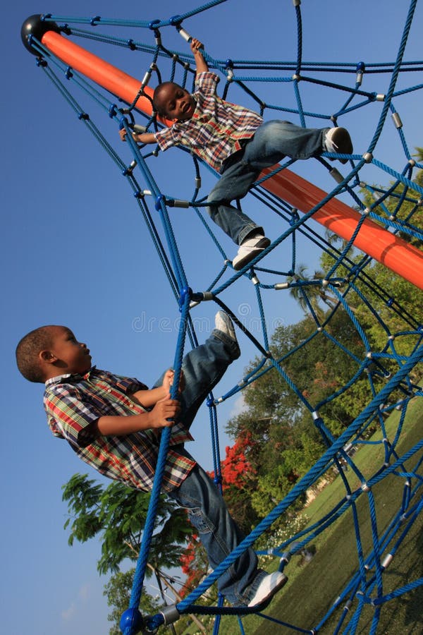 Kids on Ropes stock image. Image of dressed, boys, outside - 5489393