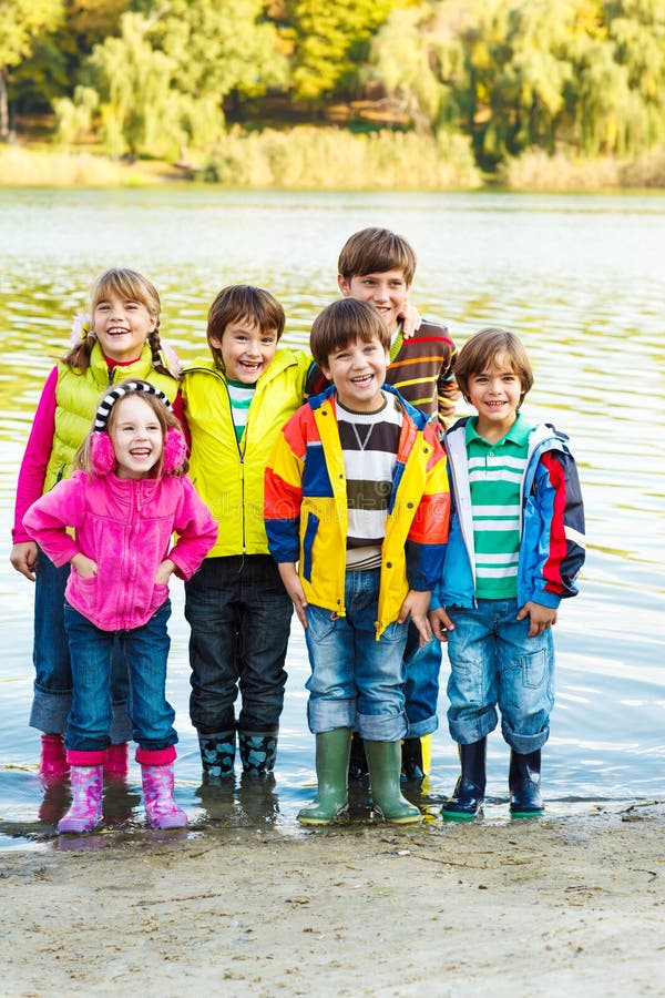 Kids in rubber boots stock image. Image of autumnal, boots - 27028771