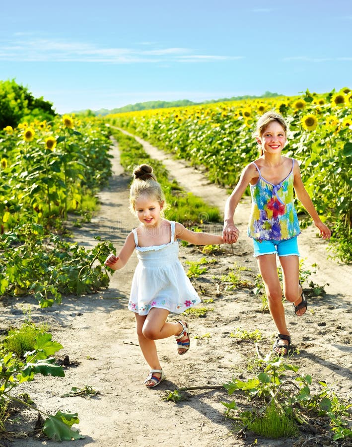 Kids Running Across Field Outdoor. Stock Image - Image of kids, nature ...