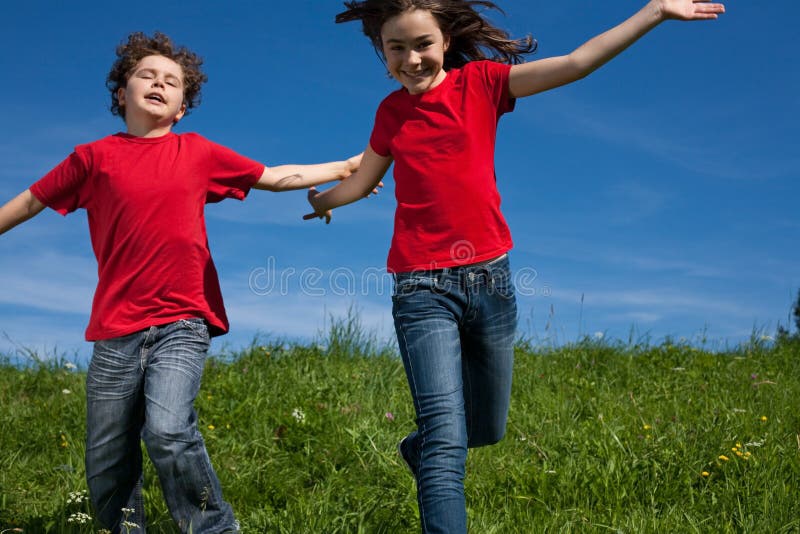 Kids running outdoor stock image. Image of leap, female - 10985173