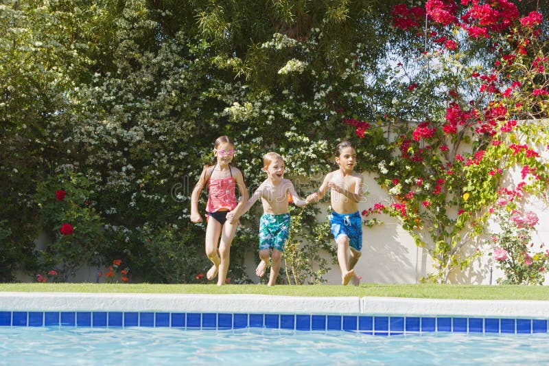 Swimming Pool and Illuminated Modern House Stock Photo - Image of porch ...
