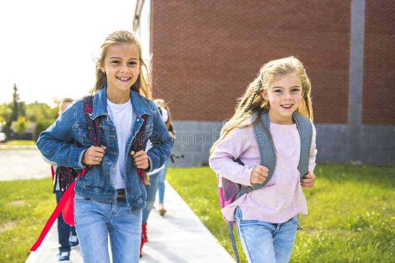 Group of Kids on the School Background Having Fun Stock Image - Image ...