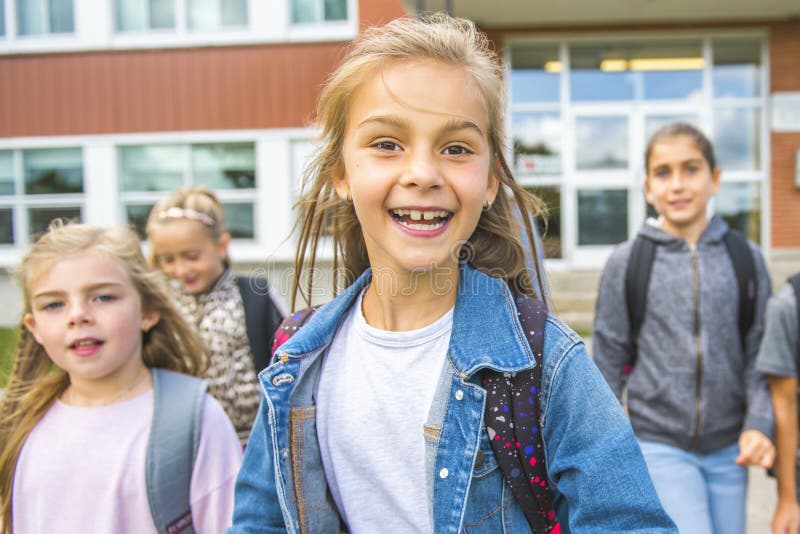 Group of Kids on the School Background Having Fun Stock Image - Image ...