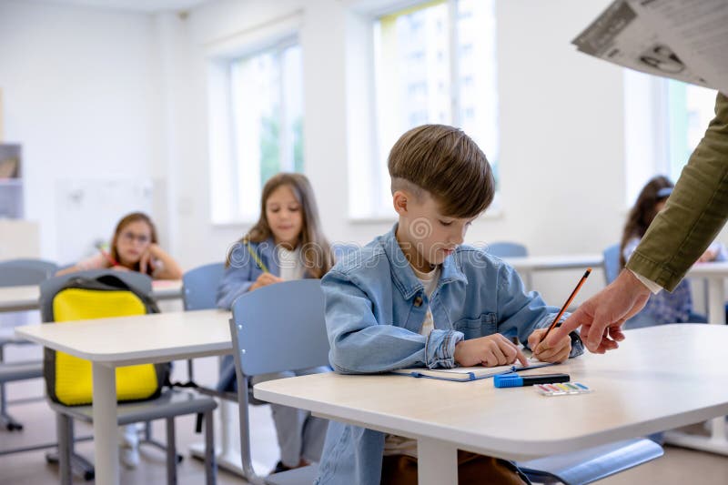 Kids at School Sitting at the Lesson and Looking Involved Stock Image ...
